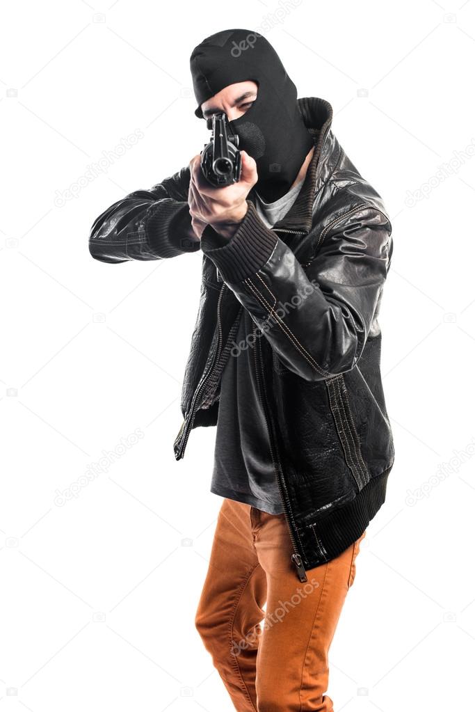 Robber holding a rifle Stock Photo by ©luismolinero 90734508