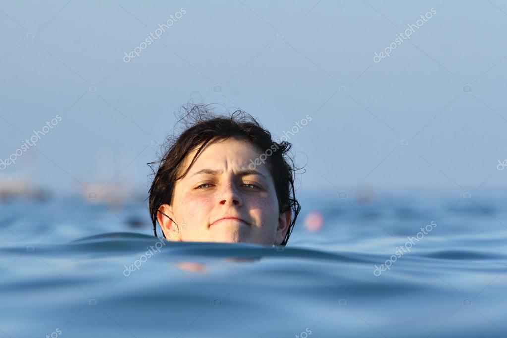Swimmer shead above water — Stock Photo © grigvovan #54006277