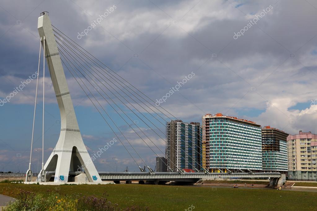 Single-span cable-stayed bridge with one pylon and heating main — Stock ...