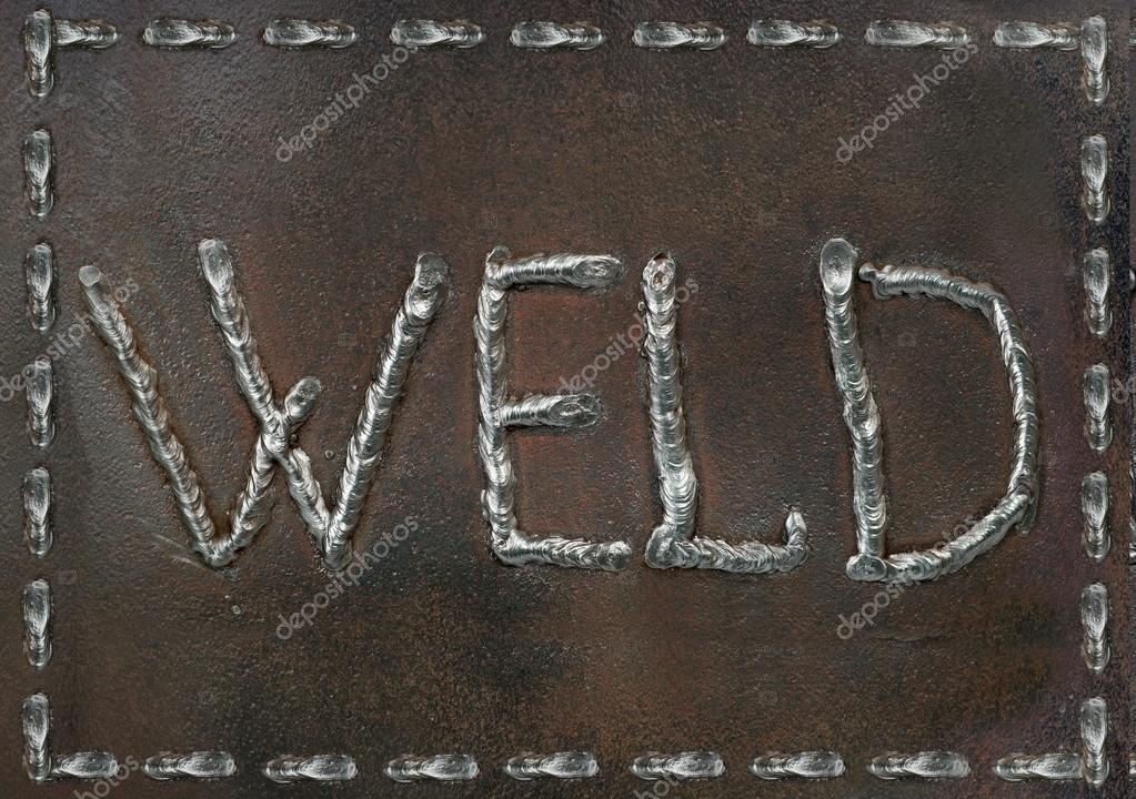 Caption welding. Weld in the form of letters Stock Photo by ...