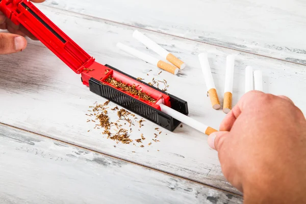 Cigarette making machine Stock Photos, Royalty Free Cigarette making ...