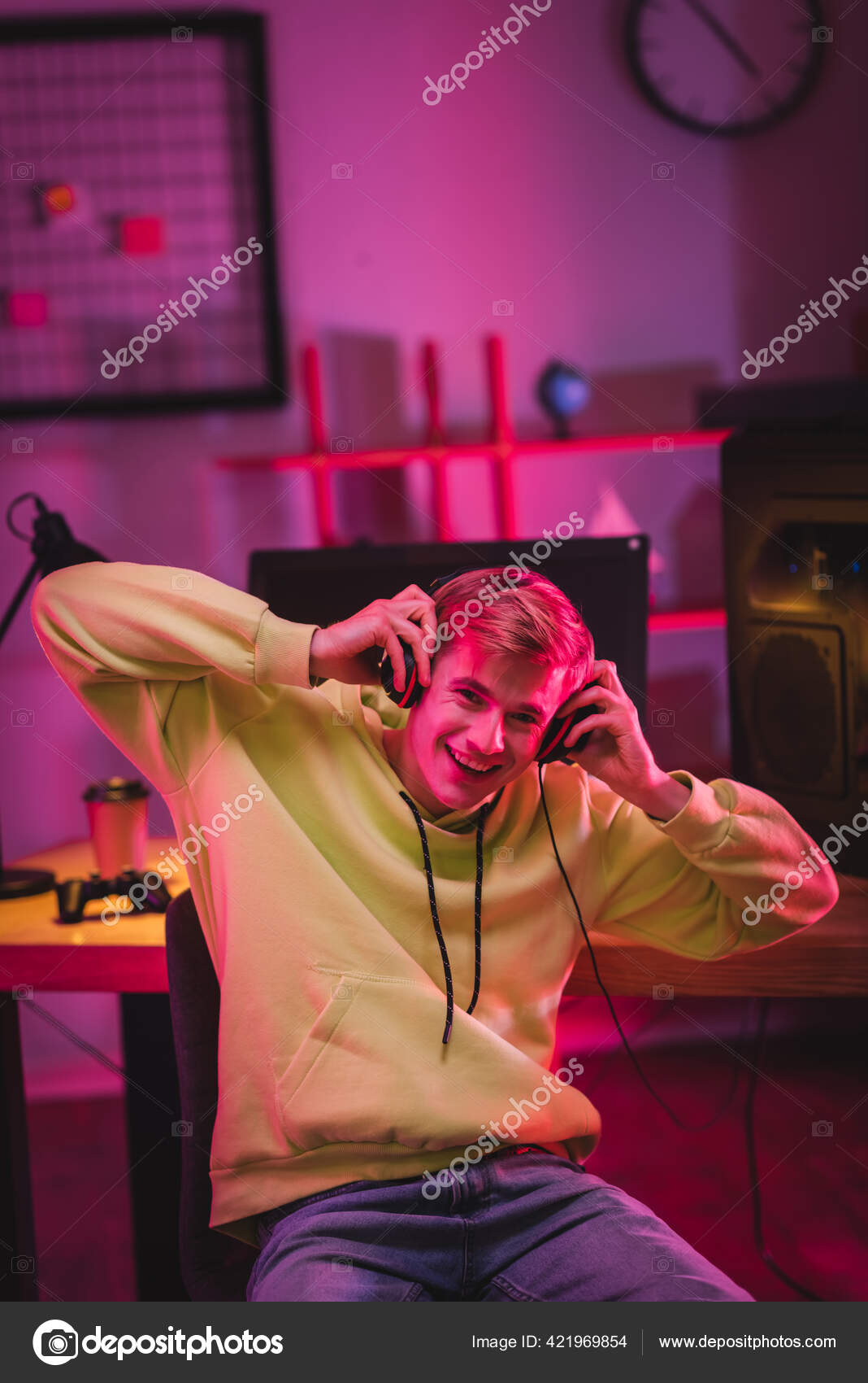 Cheerful Gamer Holding Headphones Computer Joystick Blurred Background ...