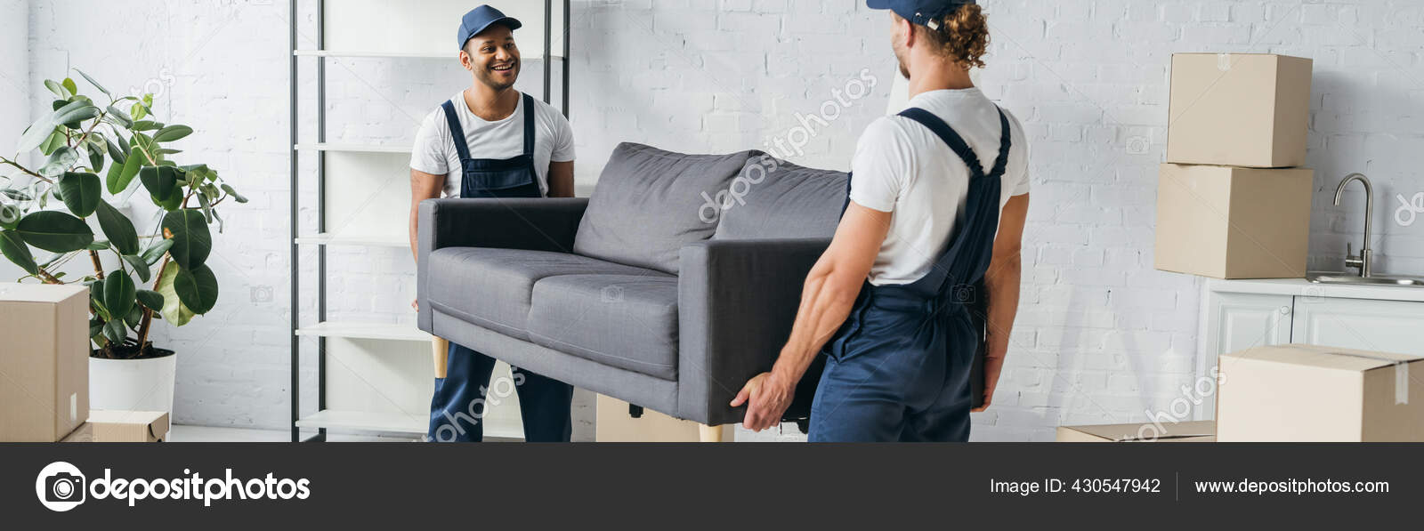 Smiling Multiethnic Movers Uniform Carrying Couch Apartment Banner ...