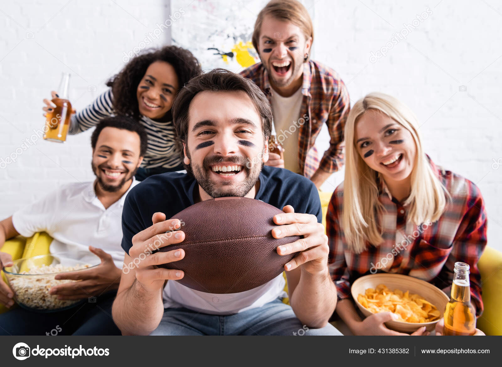 Excited Man Holding Rugby Ball While Watching Championship Multiethnic ...