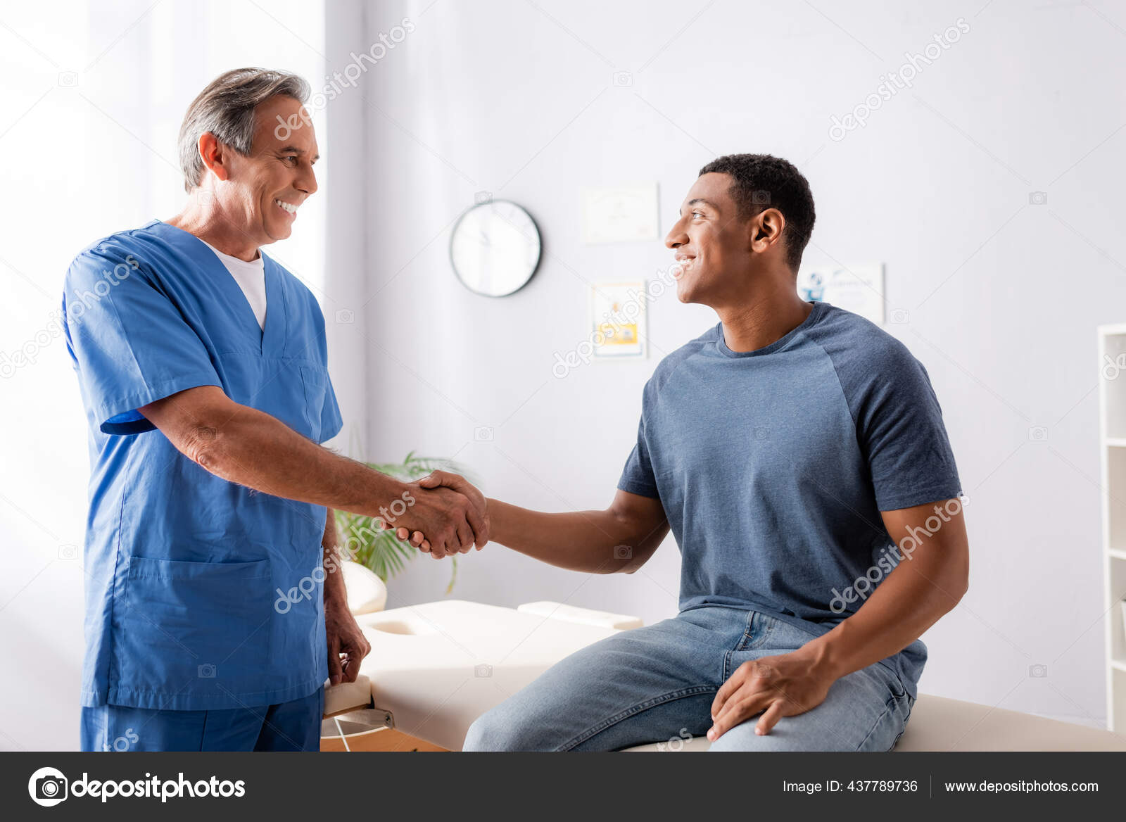 Happy Chiropractor Shaking Hands African American Patient — Stock Photo ...