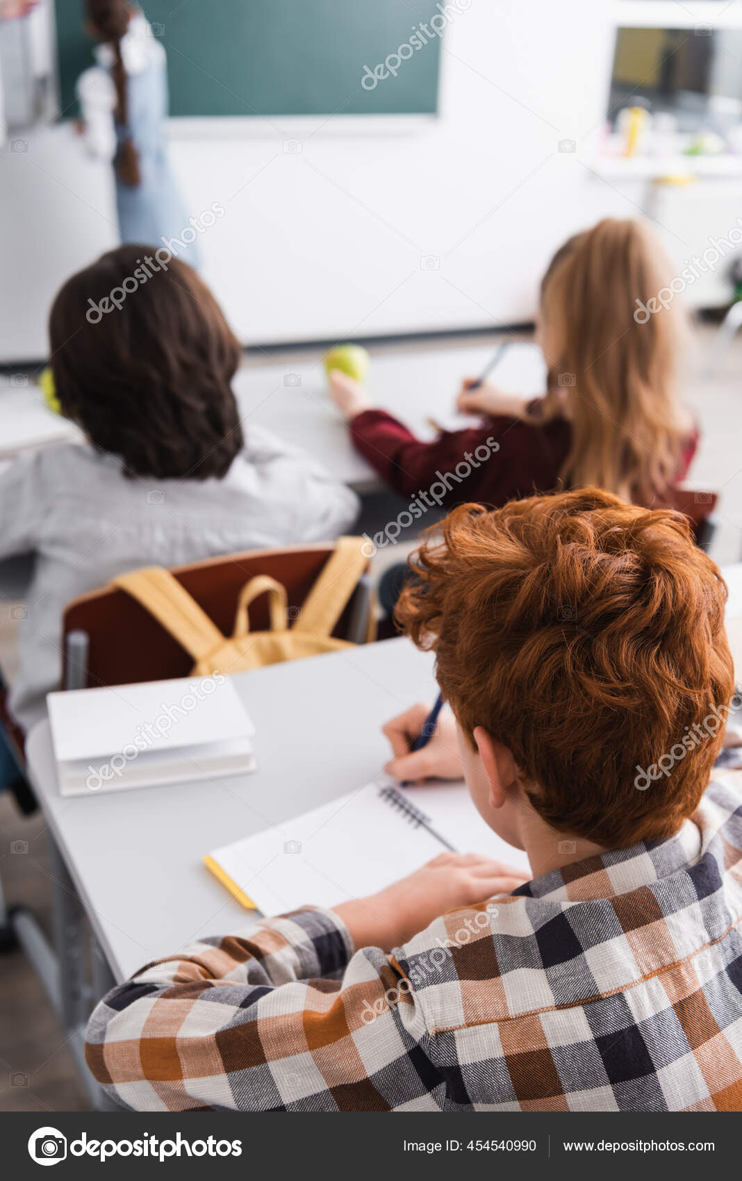 Back View Pupils Writing Notebooks Classroom Blurred Background Stock ...