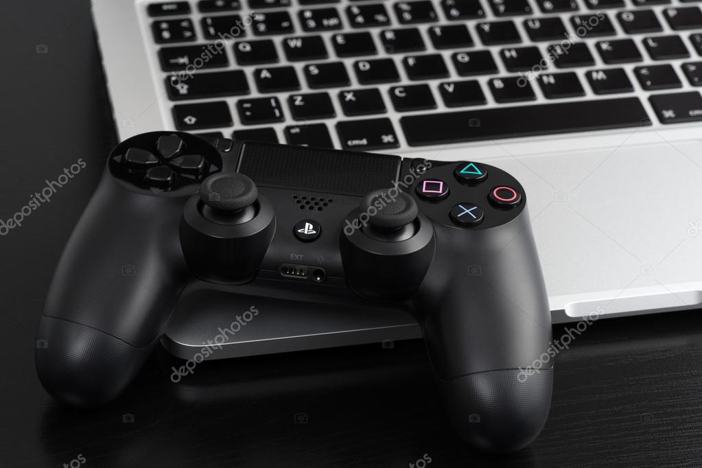 The new Sony Dualshock 4 — Stock Editorial Photo © samsonovs #115526548