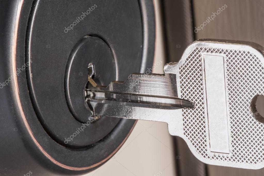 Key in Lock Stock Photo by ©icemanj 103973920