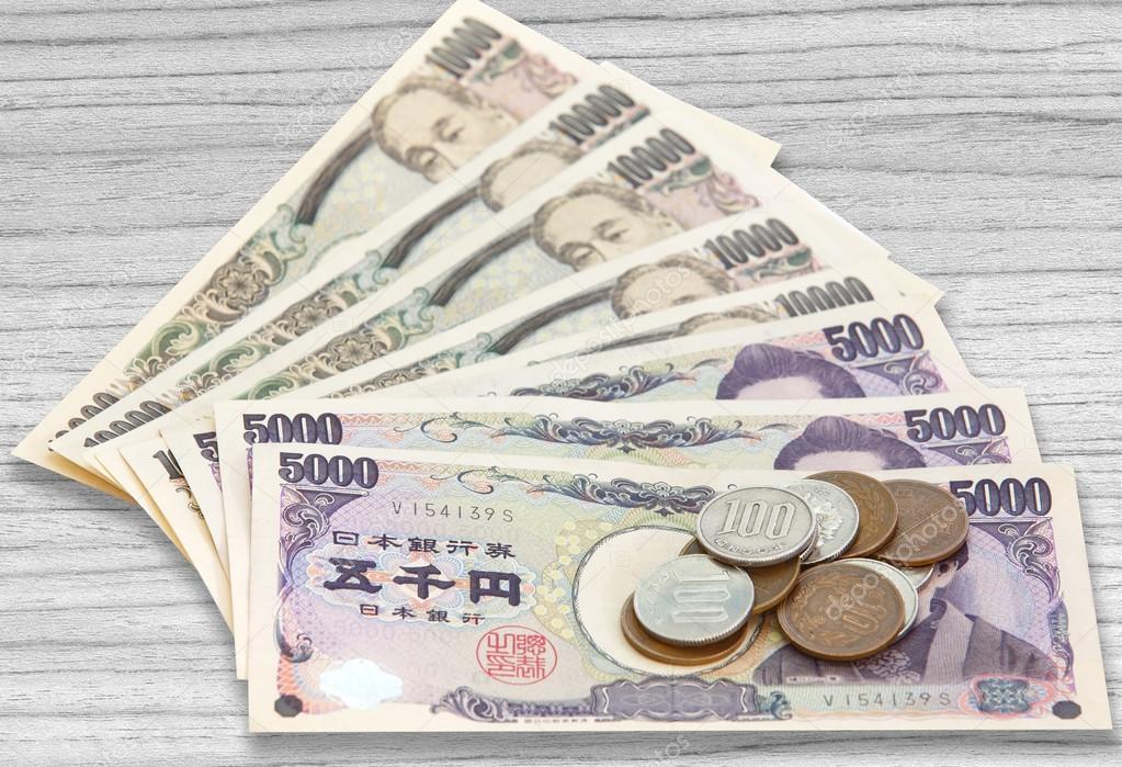 Stack of japanese currency — Stock Photo © Torsakarin #83838354
