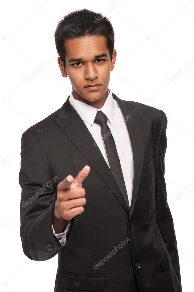 Serious Young Man Pointing His Finger — Stock Photo © SLP_London #71317213