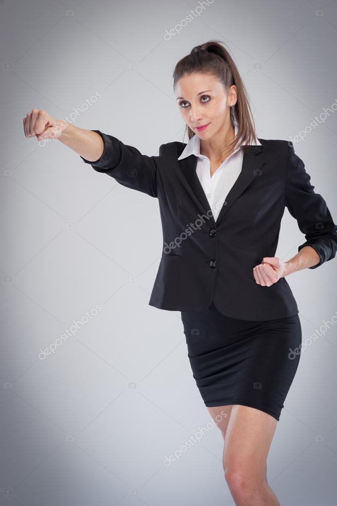 Powerful Business Woam Pulling A Punch Stock Photo by ©SLP_London 72447663