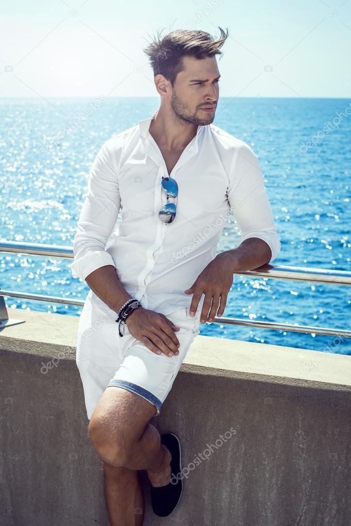 Man wearing white clothes Stock Photo by ©kiuikson 104106660