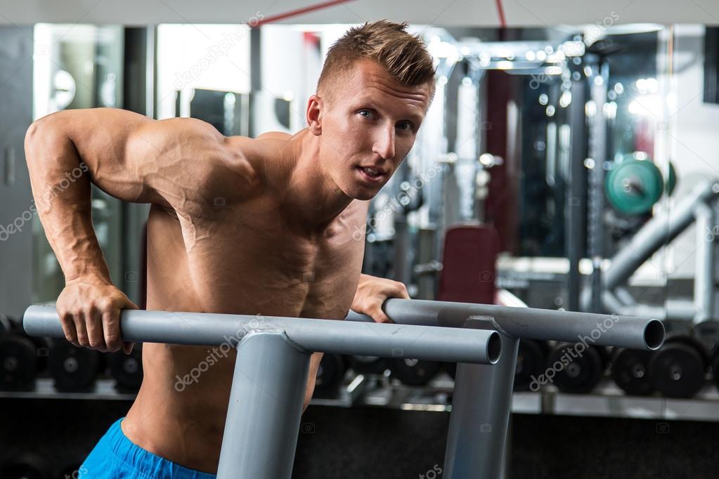 Man during workout in gym — Stock Photo © AY_PHOTO #106322018