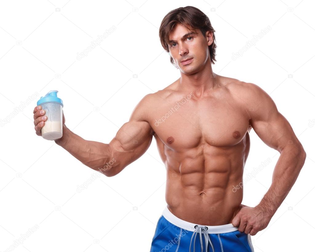 Muscular man with protein drink Stock Photo by ©AY_PHOTO 106358504