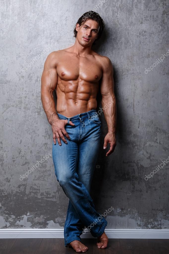 Muscular man in jeans Stock Photo by ©AY_PHOTO 106360608