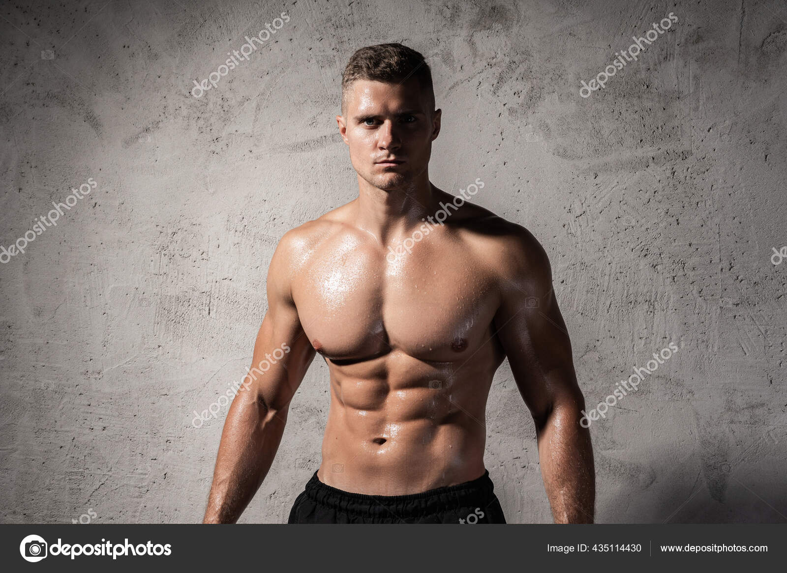 Sweaty Muscular Man Posing Concrete Wall — Stock Photo © AY_PHOTO ...