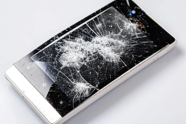 Damaged display on smartphone — Stock Photo © AY_PHOTO #66960407