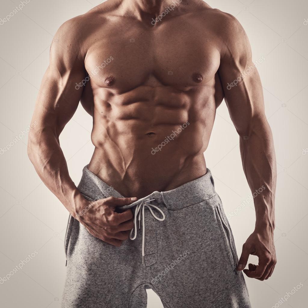Muscular male torso — Stock Photo © AY_PHOTO #76925671