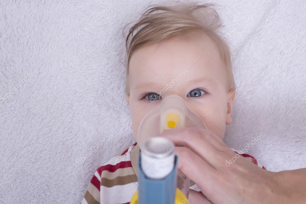Infant with asthma inhalator Stock Photo by ©Taborsky 90175108