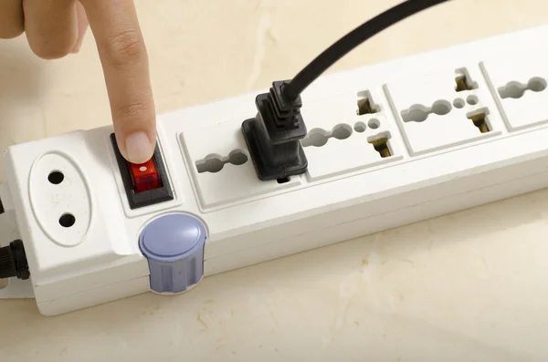 hand turn on switch multiple socket plug - Stock Image - Everypixel