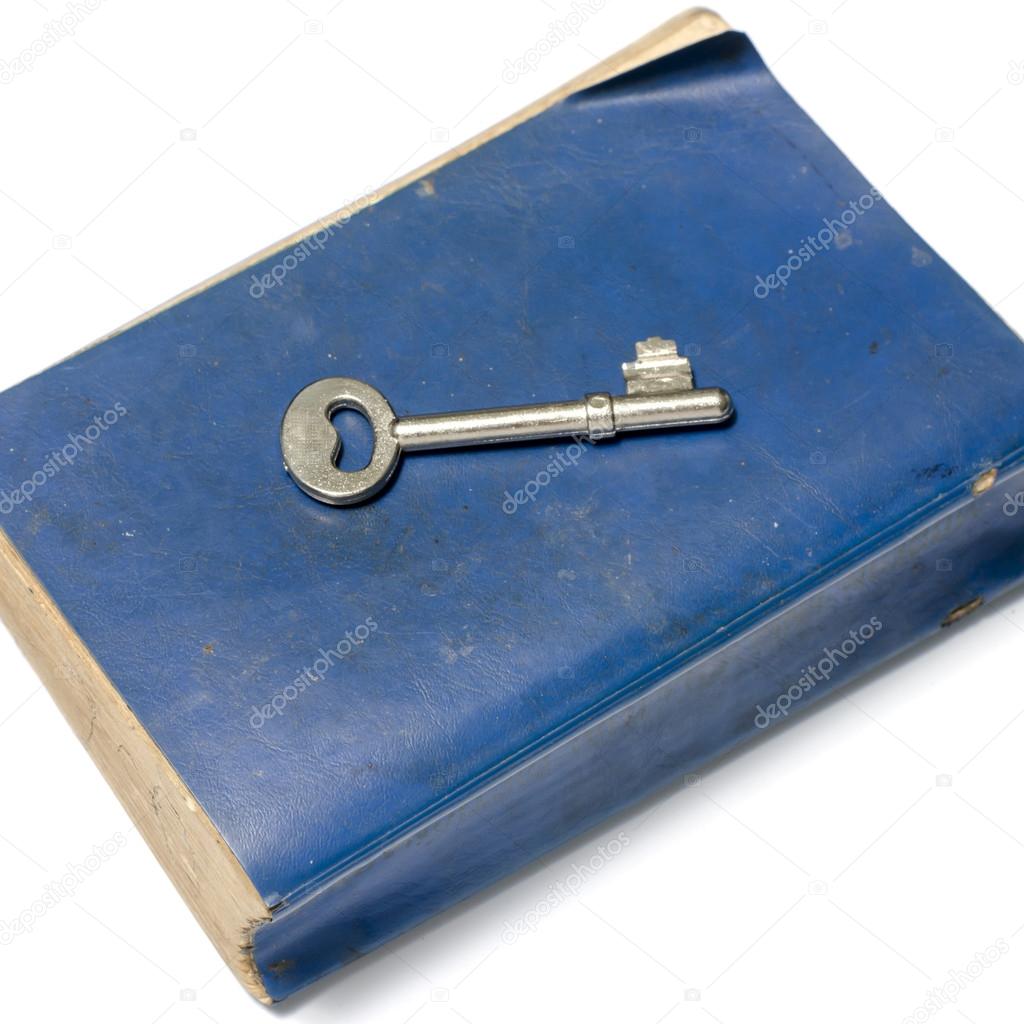 Old book with key — Stock Photo © ammza12 #57974945
