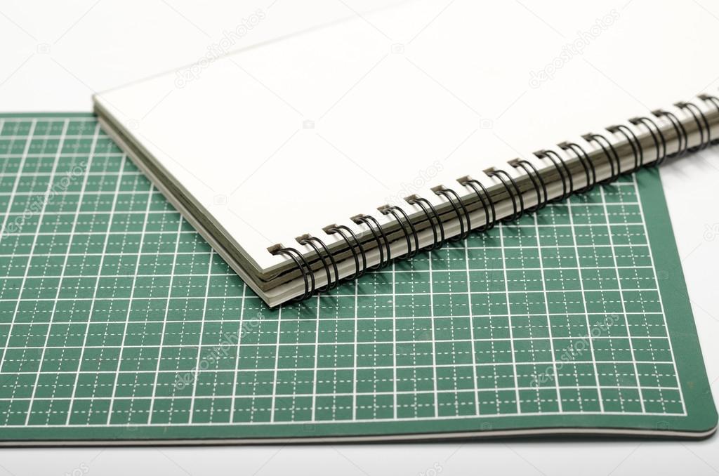 Notebook and cutting mat — Stock Photo © ammza12 #60589015