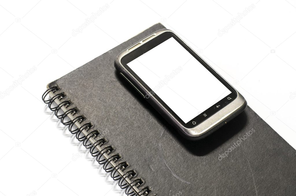 Smartphone on note book — Stock Photo © ammza12 #62032047