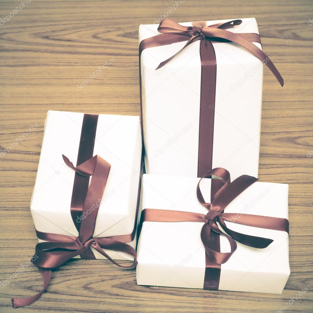 White gift boxes with ribbon Stock Photo by ©ammza12 78298726