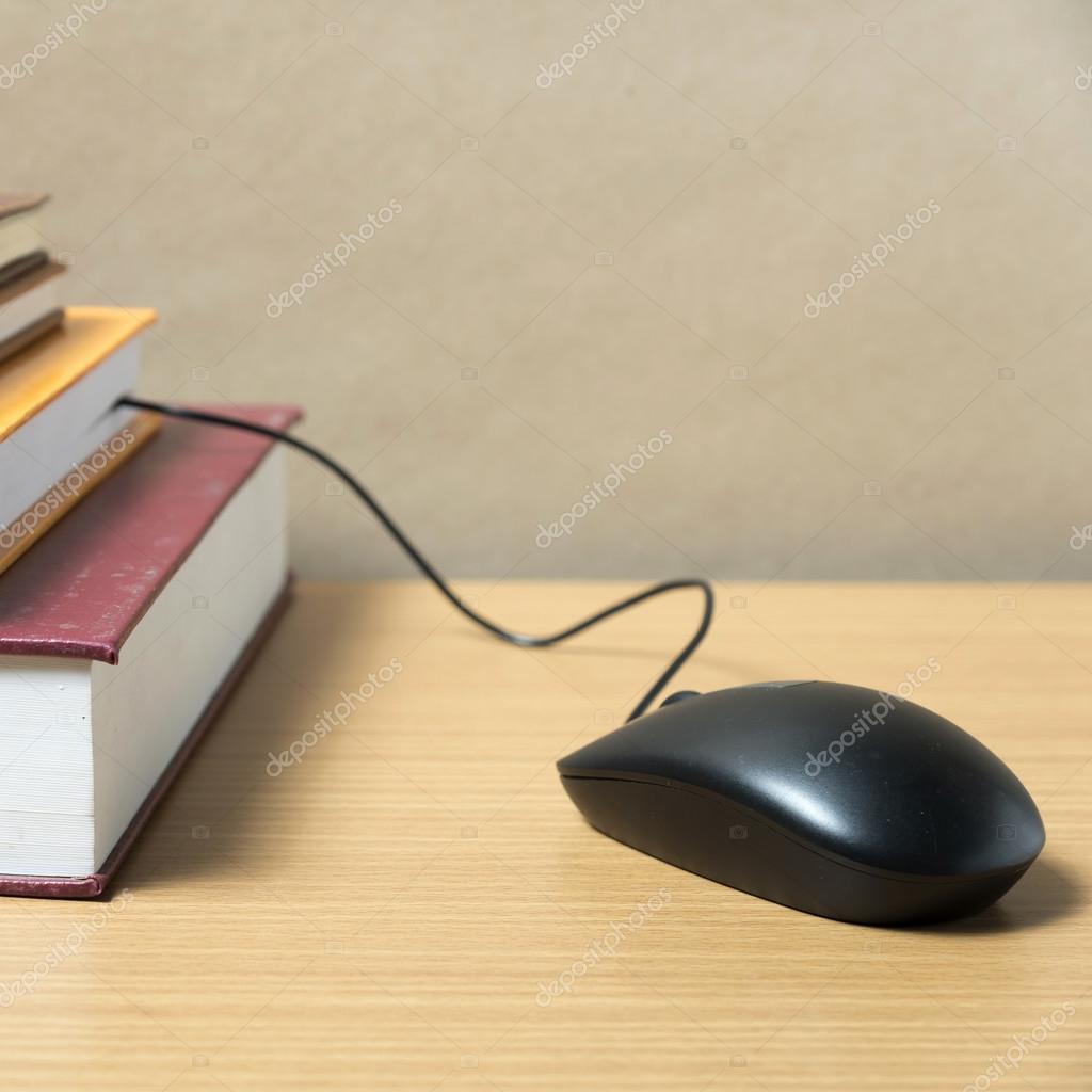 Book and computer mouse Stock Photo by ©ammza12 78308862