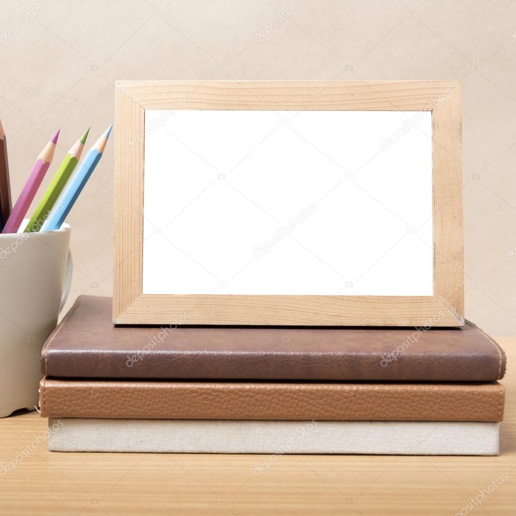Stack of book and photo frame with color pencil — Stock Photo © ammza12 ...
