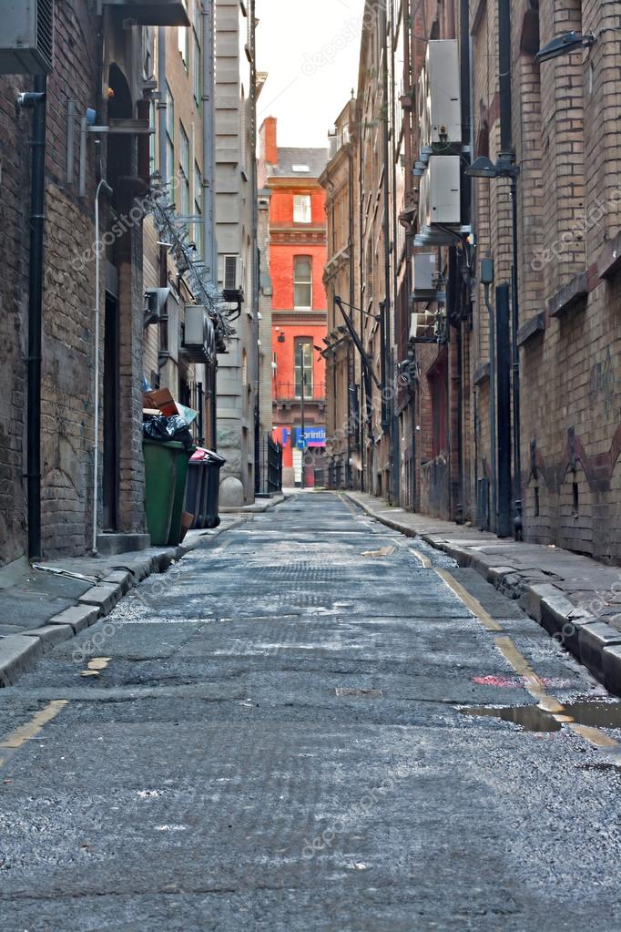 Looking down an empty inner city alleyway — Stock Photo © illu #60247799