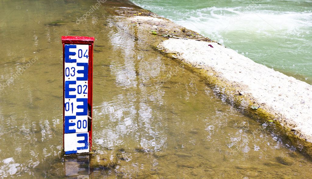 Water level indicator dam Stock Photo by ©bymandesigns 53972831