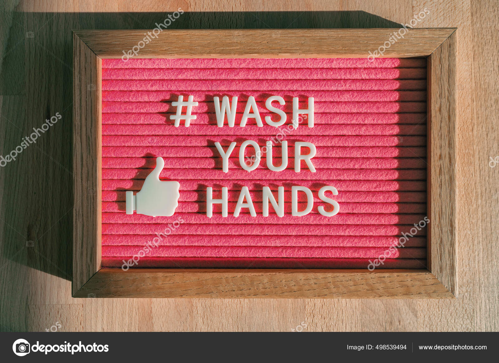 Wash your hands hashtag message on felt billboard board at business ...