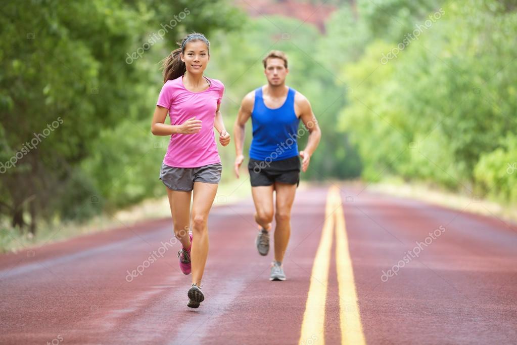 Couple training on road Stock Photo by ©Maridav 52885303