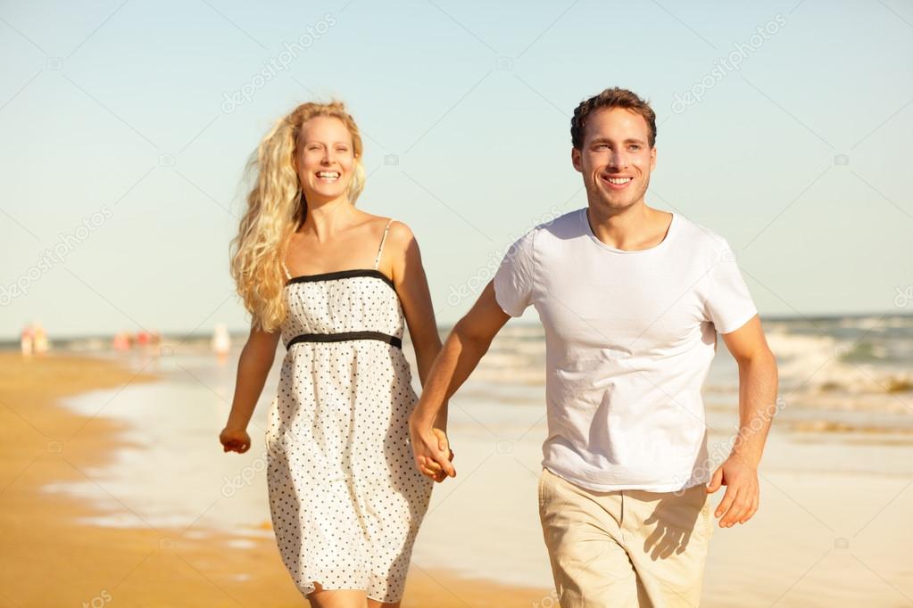 Couple Holding Hands Running