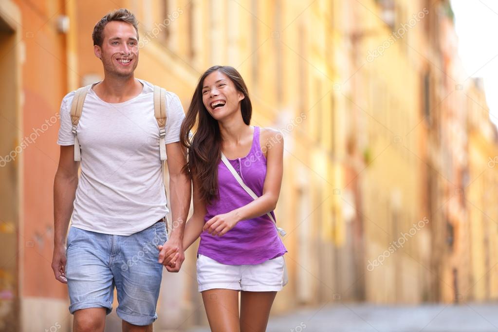 Couple holding hands walking Stock Photo by ©Maridav 52887691