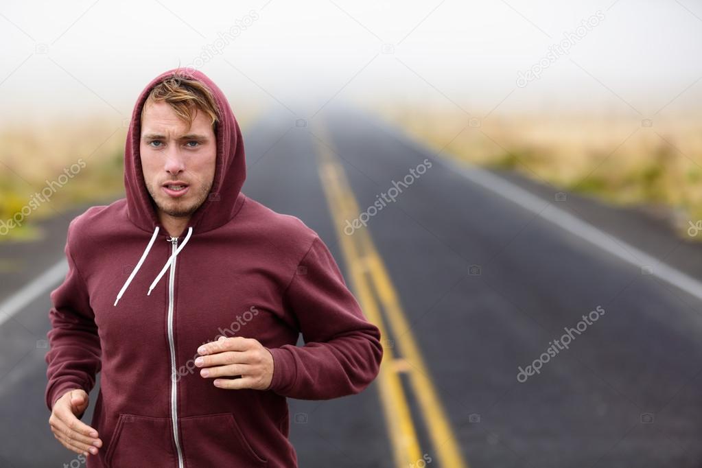 Man running on road in fall Stock Photo by ©Maridav 54893099