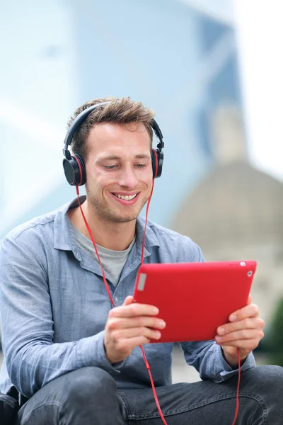 Man talking on tablet pc - Stock Image - Everypixel