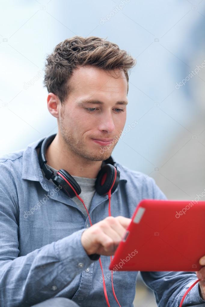 Professional man using tablet computer — Stock Photo © Maridav #62143155 Professional man using tablet computer — Stock Photo © Maridav #62143155