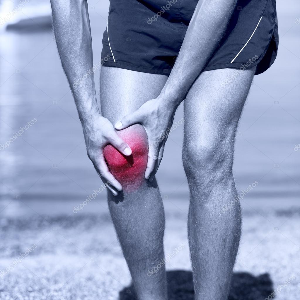Male runner with pain from sprain knee — Stock Photo © Maridav #62143619