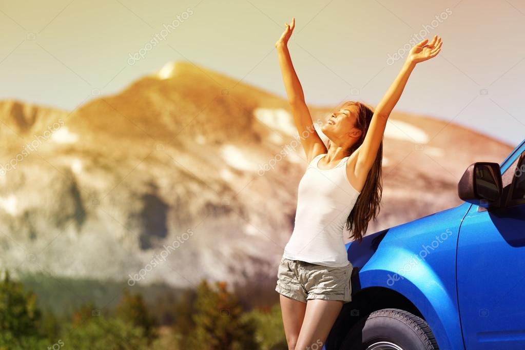 Woman next to car relaxing — Stock Photo © Maridav #72654501