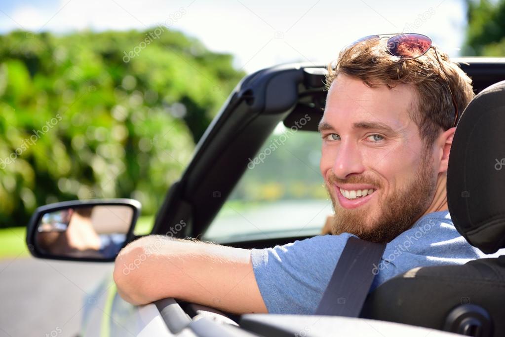 Man driving convertible on road Stock Photo by ©Maridav 72655977