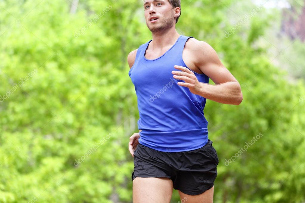 Man running on road — Stock Photo © Maridav #72655997