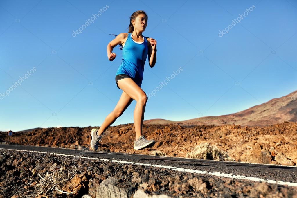 Female runner training outdoors — Stock Photo © Maridav #73838003