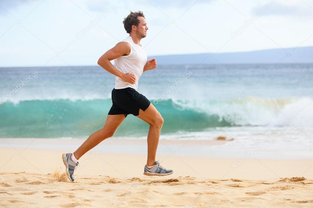 Man jogging on beach ⬇ Stock Photo, Image by © Maridav #97352804