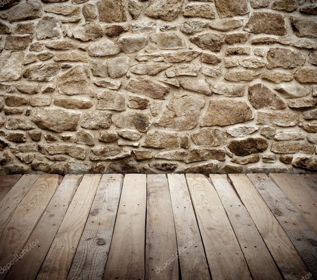 Stone wall with wooden floor Stock Photo by ©estudiosaavedra 64505875