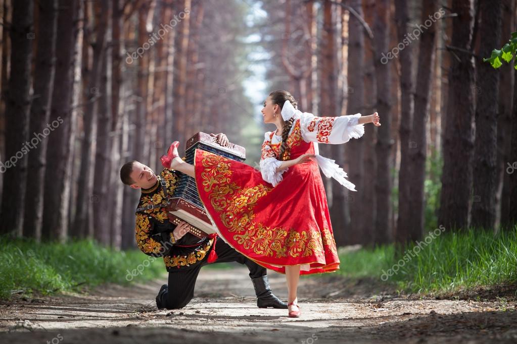Man and woman in Russian national clothes — Stock Photo ...