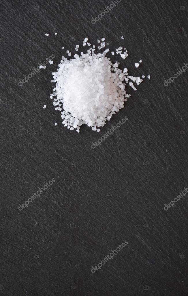 Coarse salt on a black slate table — Stock Photo © expressiovisual ...