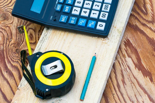 construction meter-tape measure calculator for calculations pencil and ...