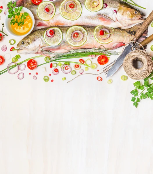fresh fish with cooking ingredients - Stock Image - Everypixel
